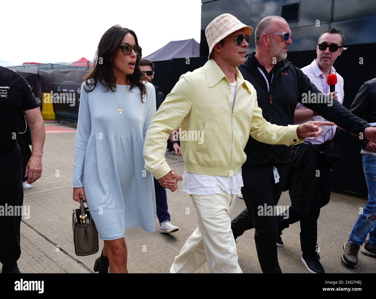 Brad Pitt and his partner Ines De Ramon arrive at Silverstone Circuit ...