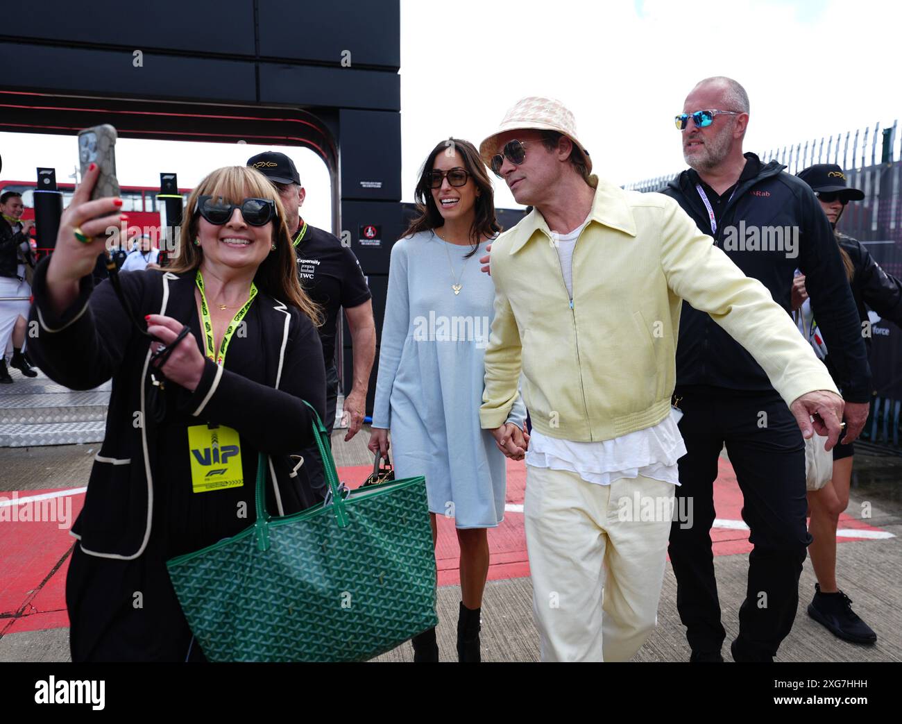 Brad Pitt and his partner Ines De Ramon arrive at Silverstone Circuit ...