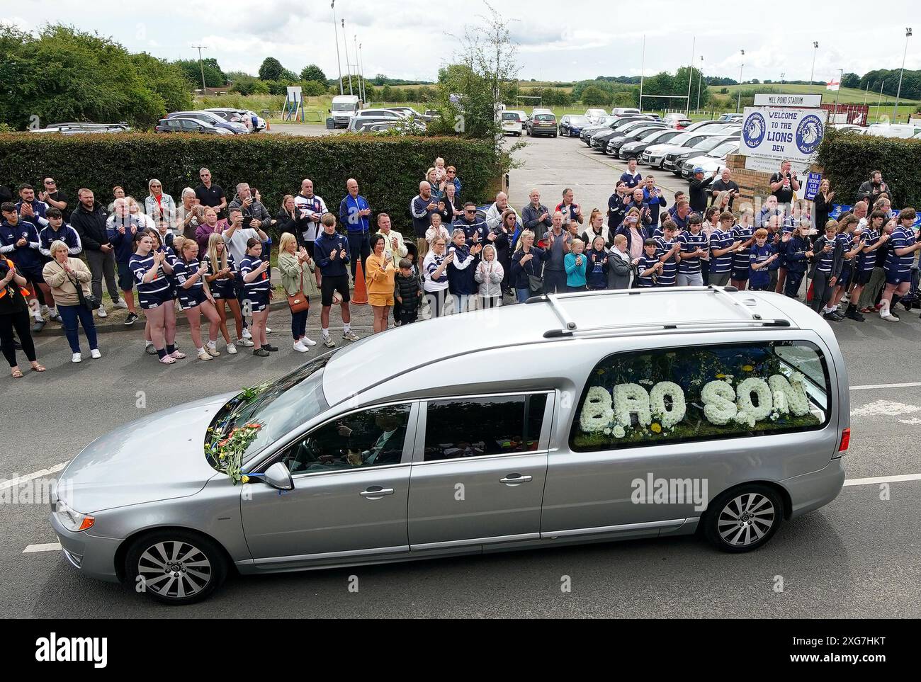 The funeral cortege passes through Featherstone town centre, West ...