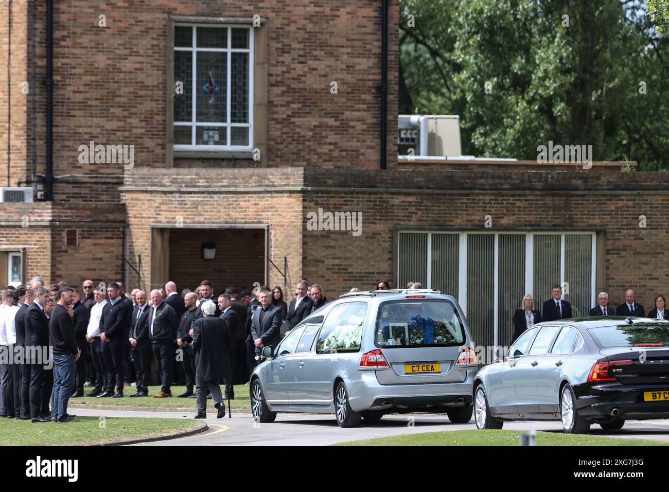 Rob Burrow CBE makes is final journey as his funeral car enters ...