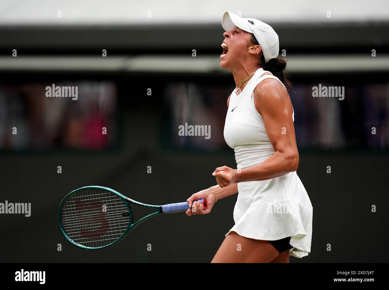 Madison Keys reacts during her match against Jasmine Paolini on day ...