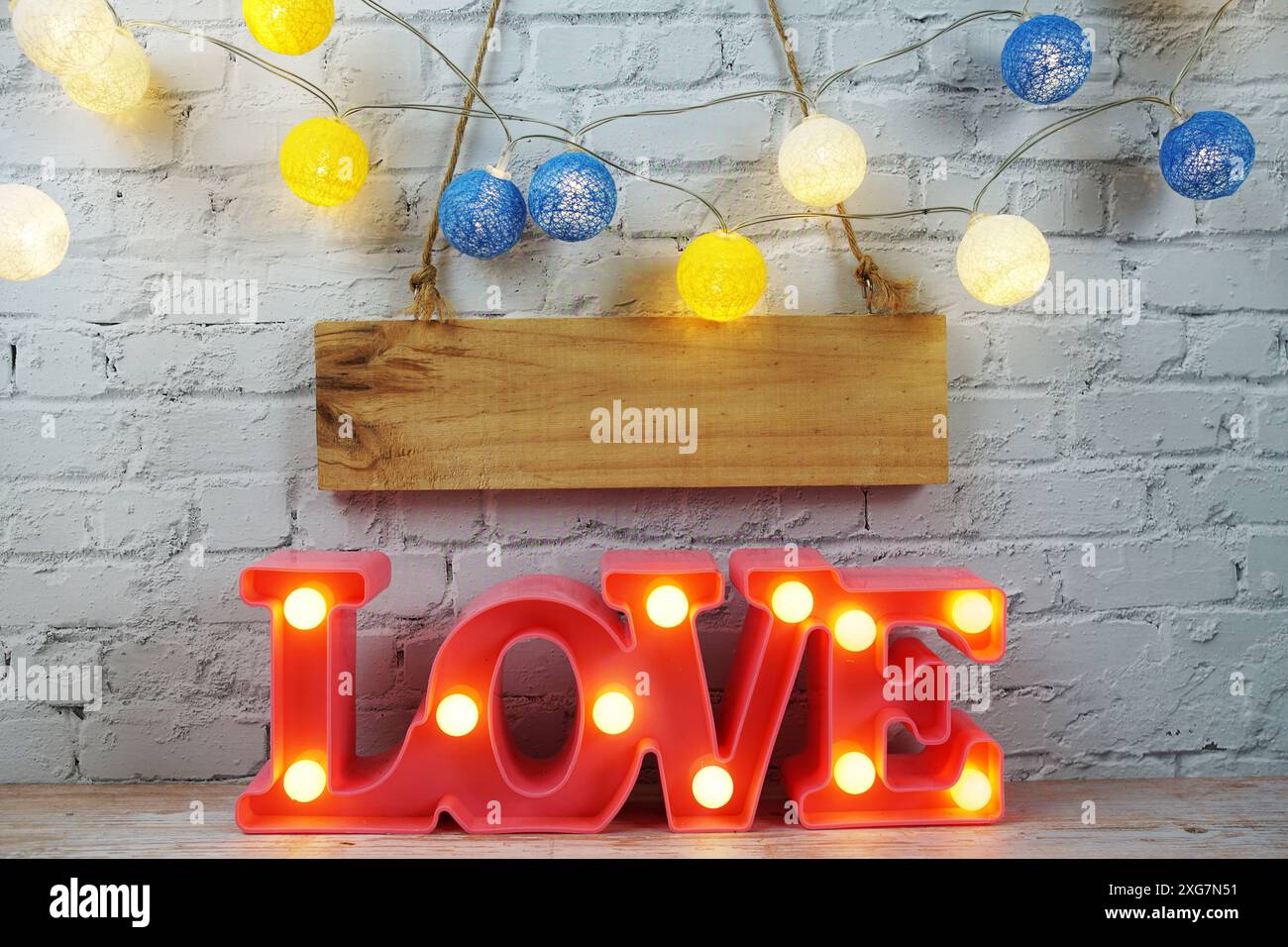 Love LED sign decorative letters for Valentine's day on white brick ...
