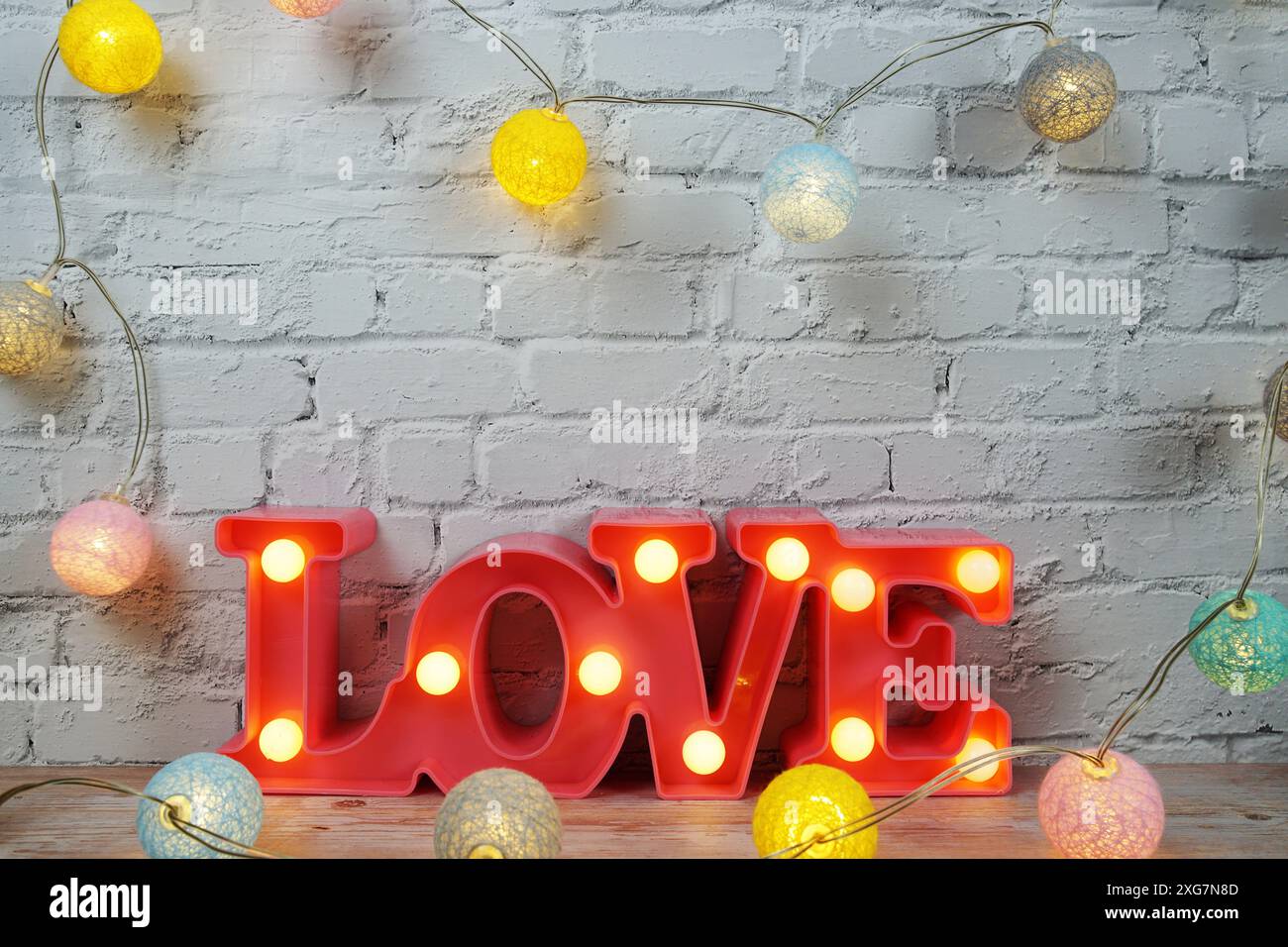 Love LED sign decorative letters for Valentine's day on white brick ...