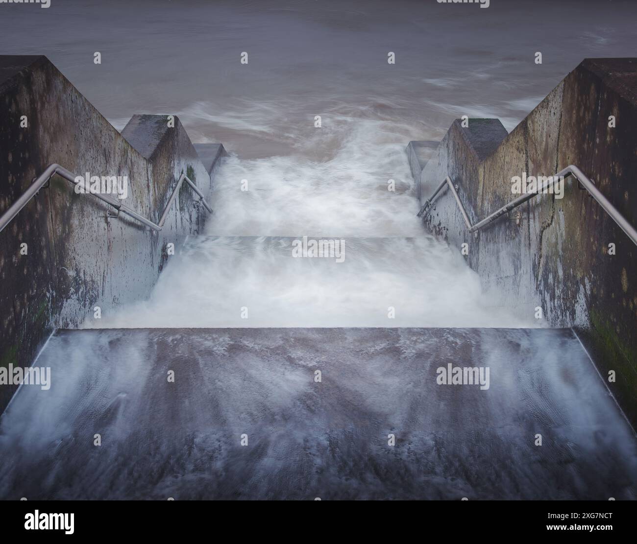 high tide advancing, the sea sea water swirling as it gradually climbs ...