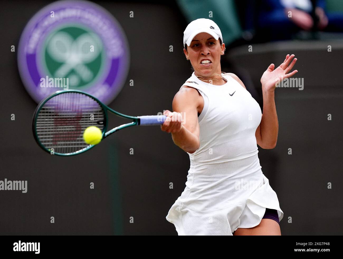Madison Keys in action against Jasmine Paolini on day seven of the 2024 ...