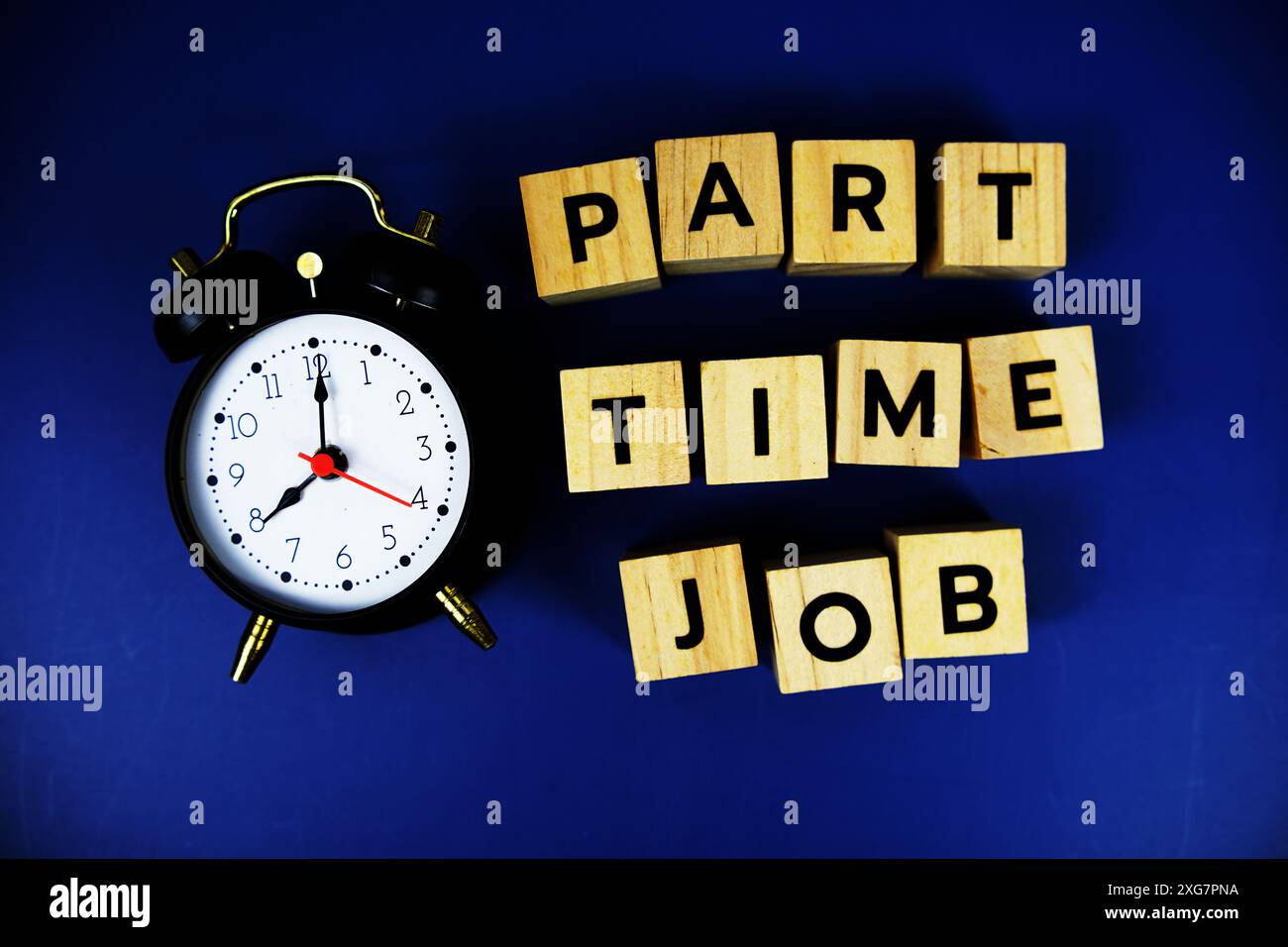 Part Time Job with wooden blocks alphabet letters and alarm clock on ...