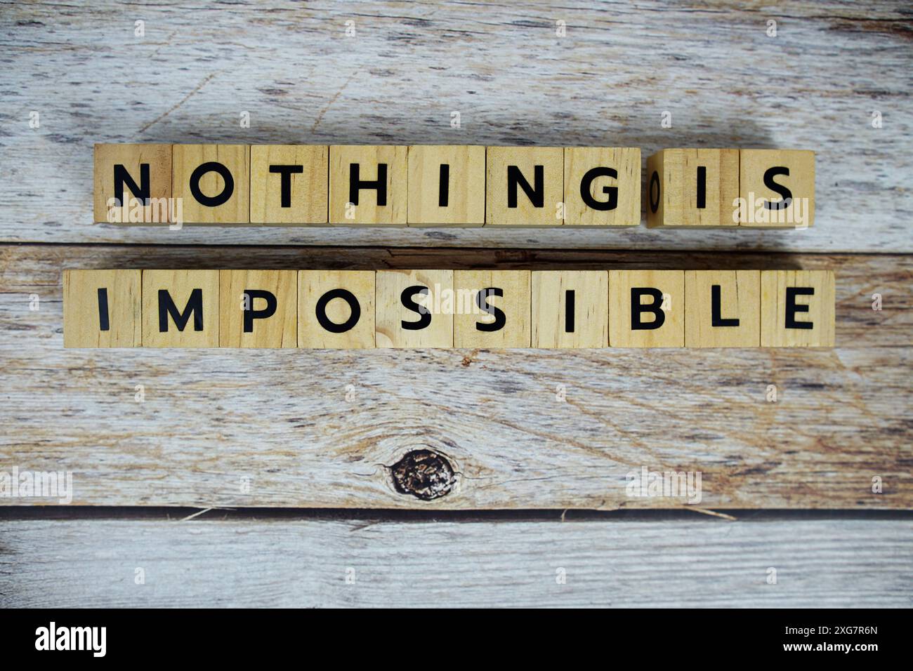 Nothing is Impossible with wooden blocks alphabet letters on wooden ... Nothing is Impossible with wooden blocks alphabet letters on wooden ...