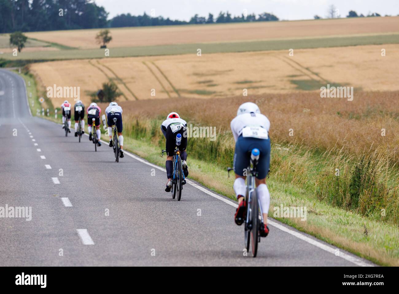 07 July 2024, Bavaria, Roth: Triathlon: Challenge Roth. Thomas Bishop (2nd from right ...