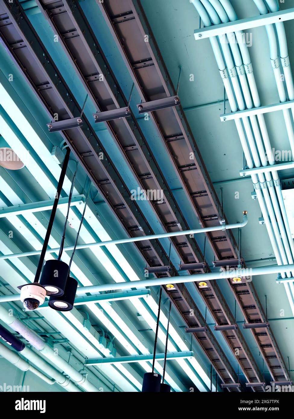 Ceiling with ventilation pipes and lights in industrial building Stock ...