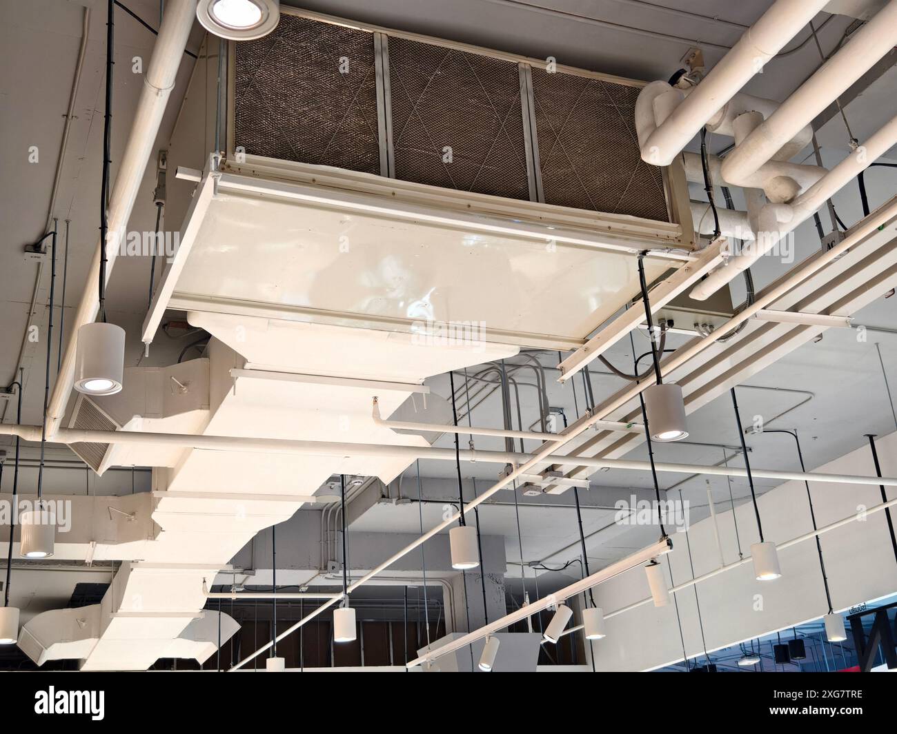 Ceiling with ventilation pipes and lights in industrial building Stock ...