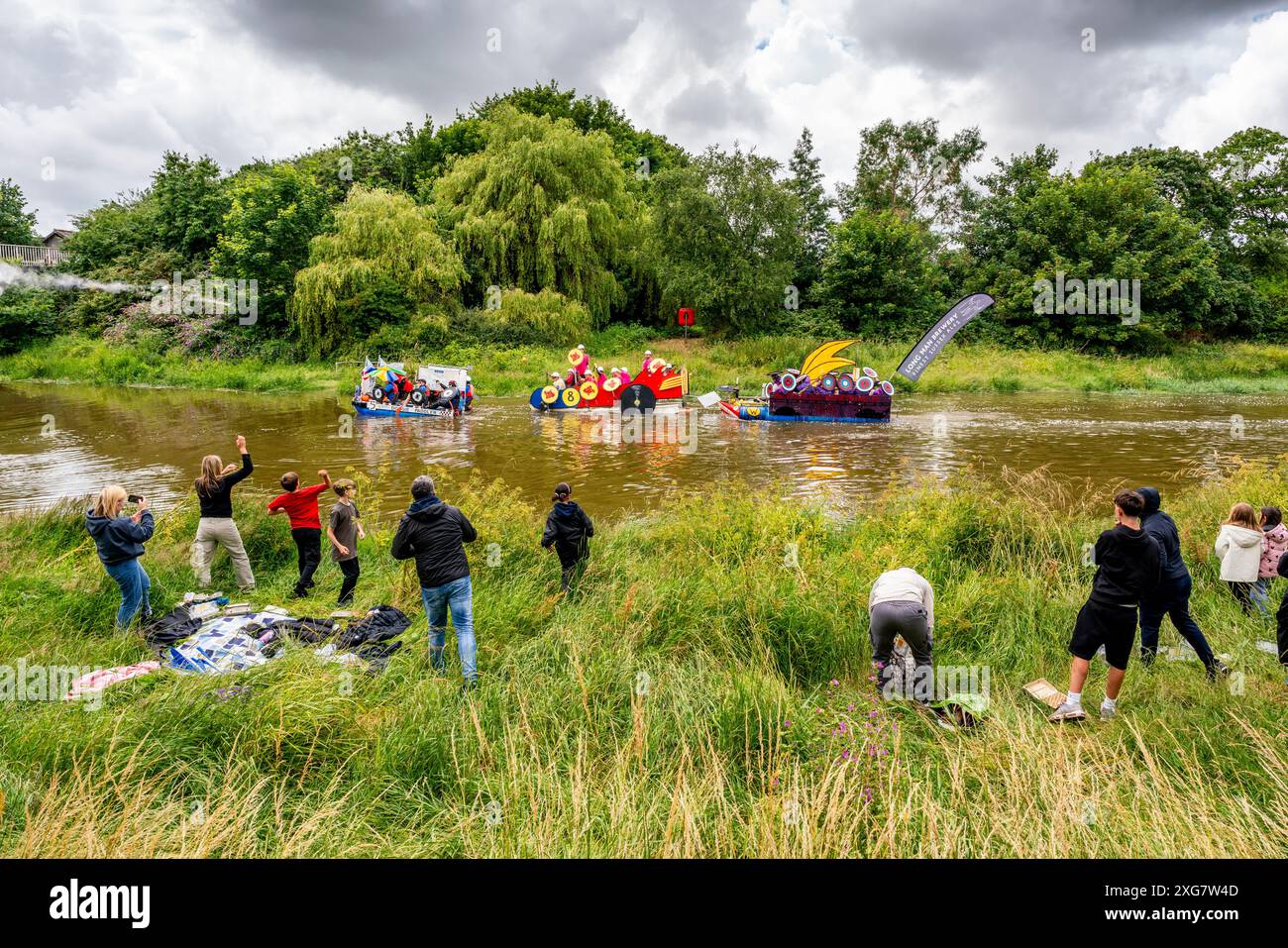 Lewes, UK. 7th July, 2024. Local people in home made rafts take part in ...