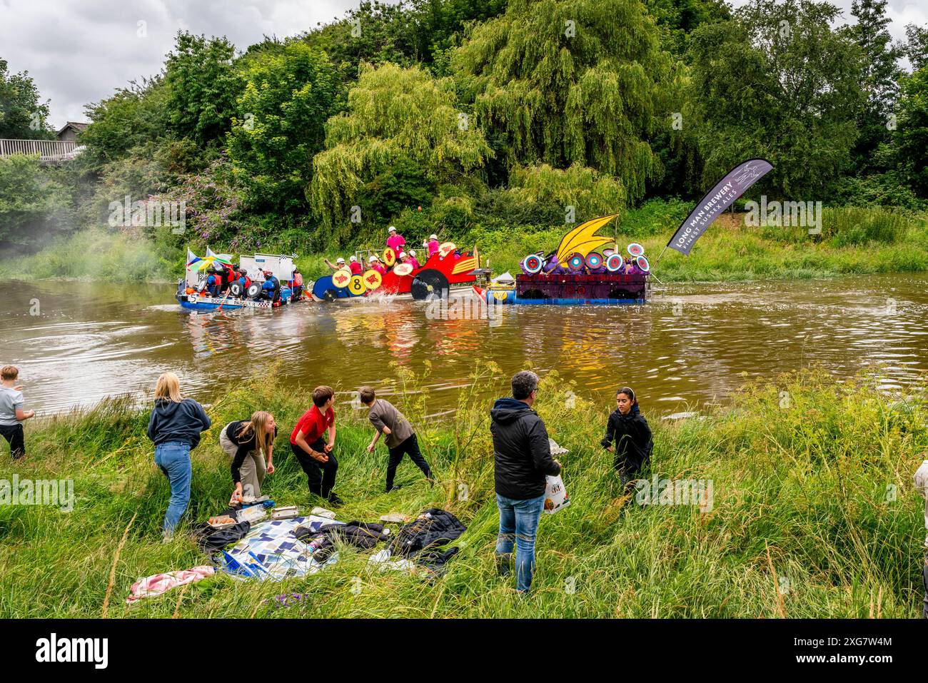 Lewes, UK. 7th July, 2024. Local people in home made rafts take part in ...