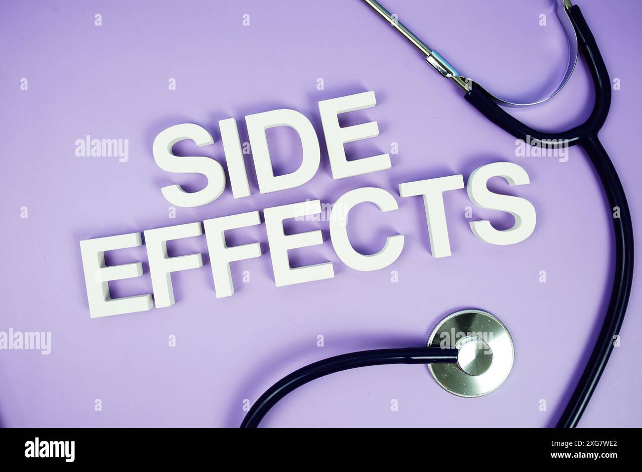 Side Effects alphabet letters and stethoscope on purple background ...