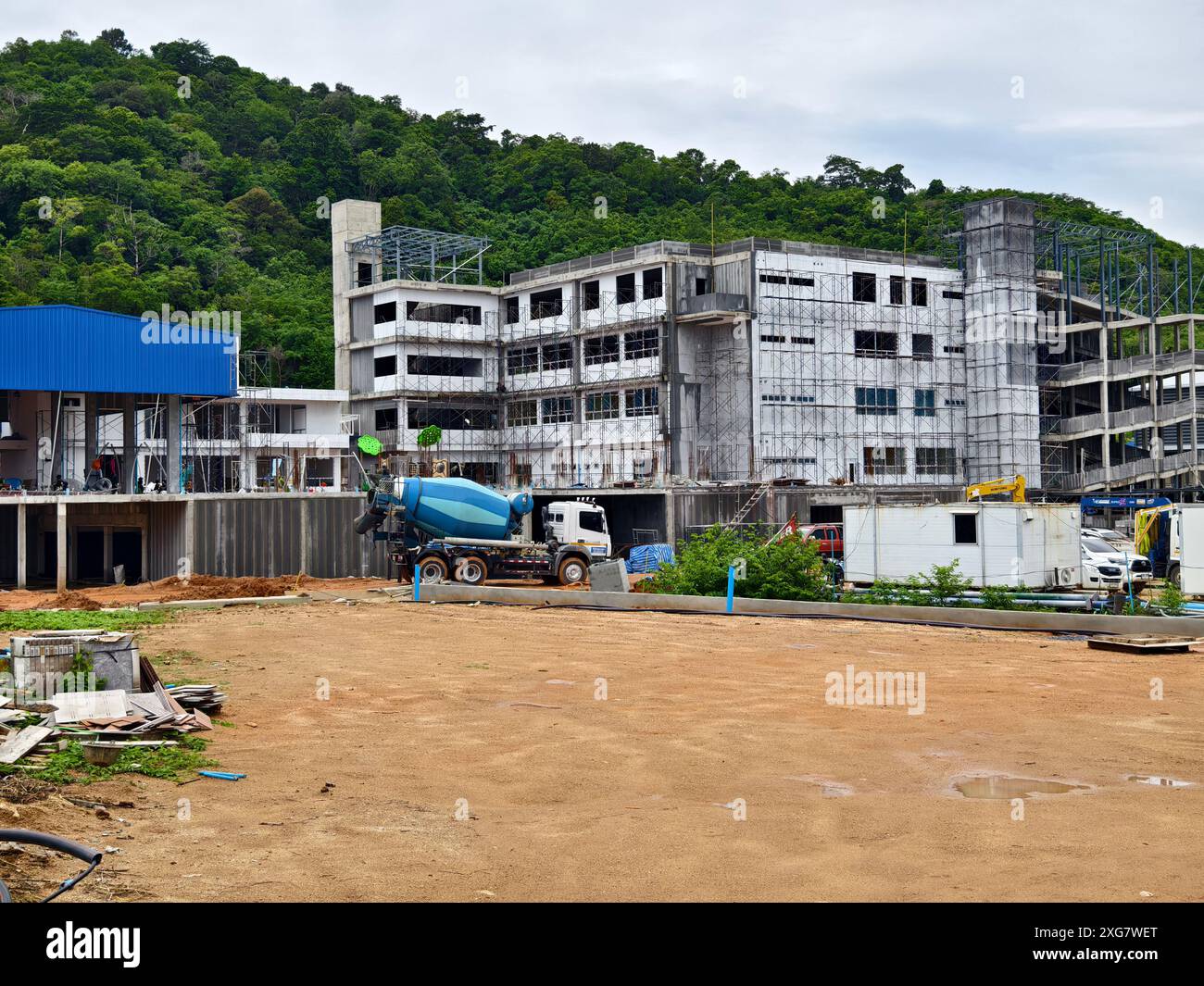 A tall building with numerous windows is being built Stock Photo - Alamy