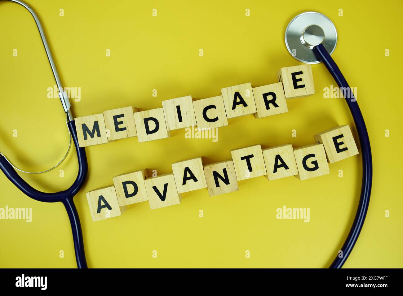Medicare Advantage with wooden blocks alphabet letters and stethoscope ...