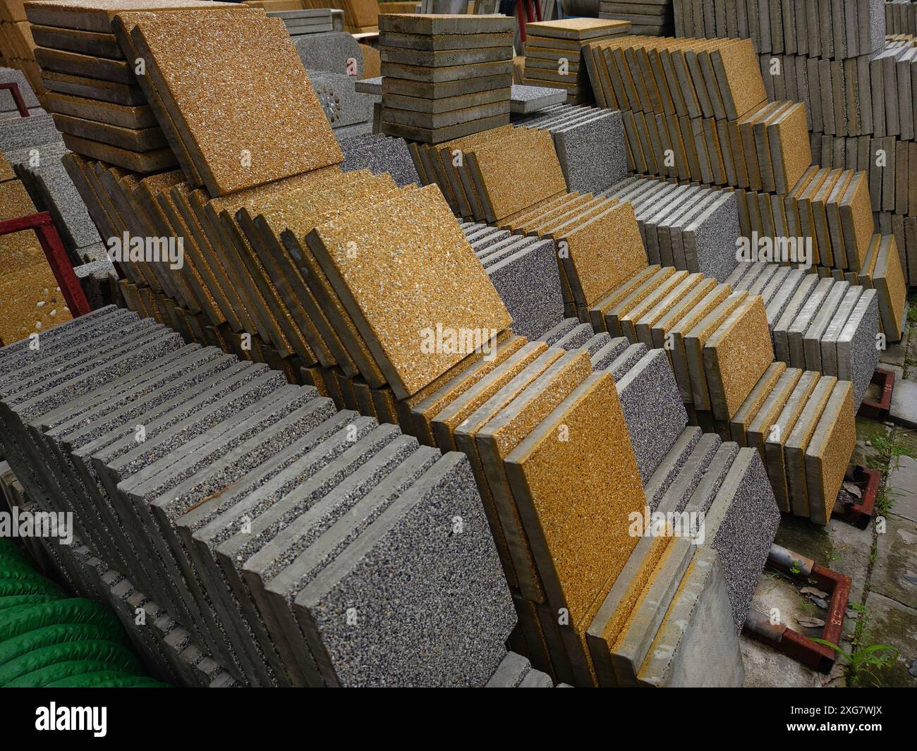 A collection of concrete tile is arranged on one another Stock Photo ...