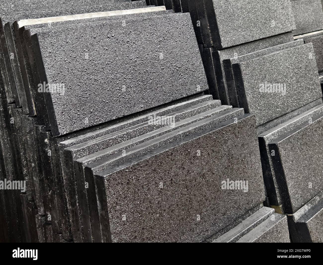 A collection of concrete tile is arranged on one another Stock Photo ...