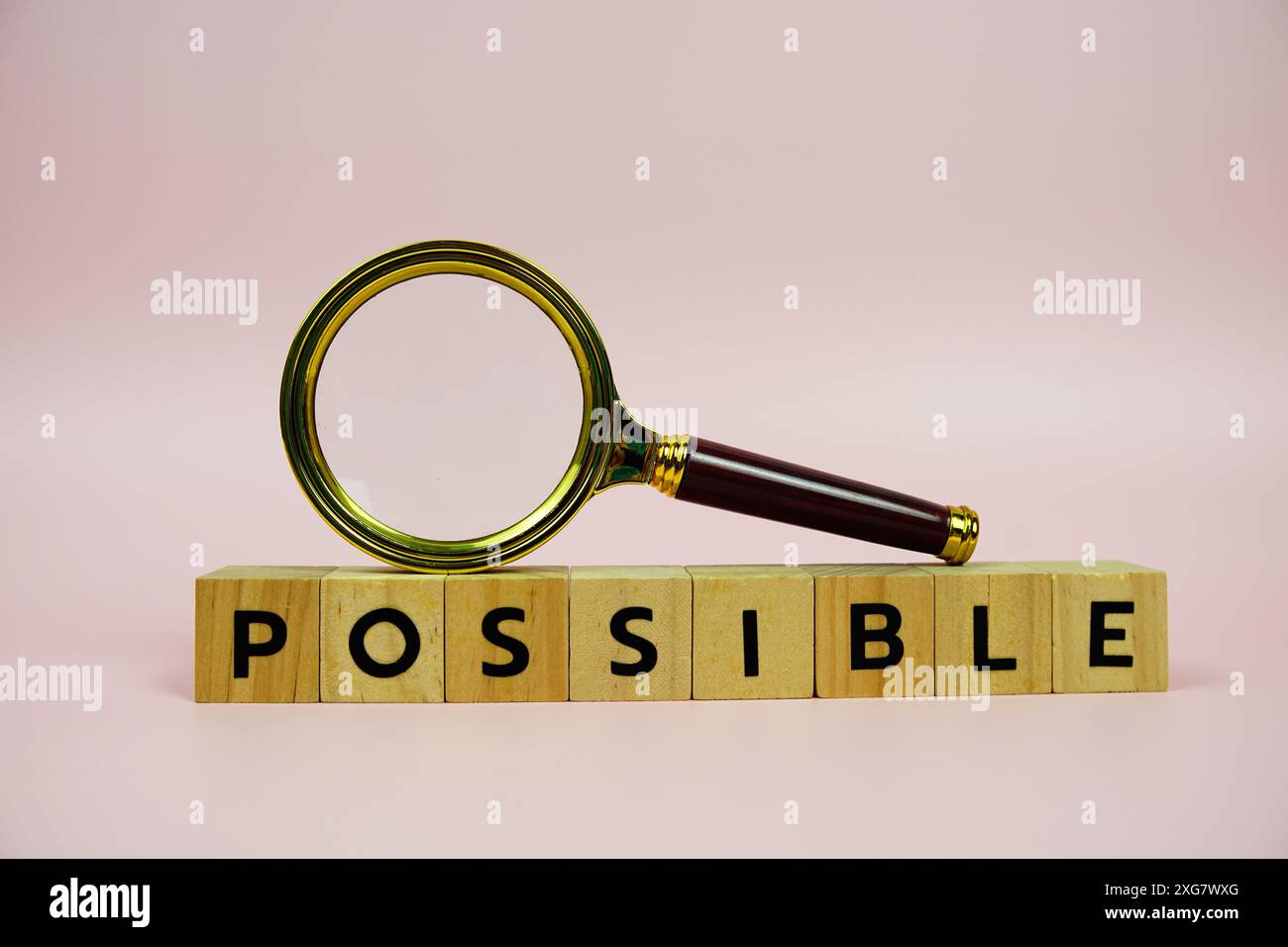 Possible with wooden blocks alphabet letters and Magnifying glass on ...