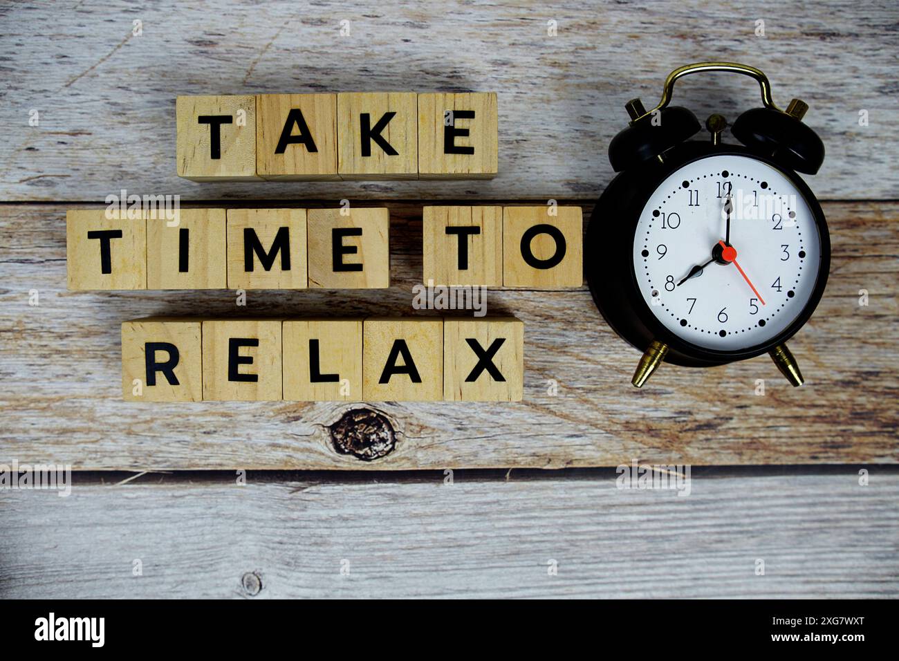 Take Time To Relax with wooden blocks alphabet letters and alarm clock ...