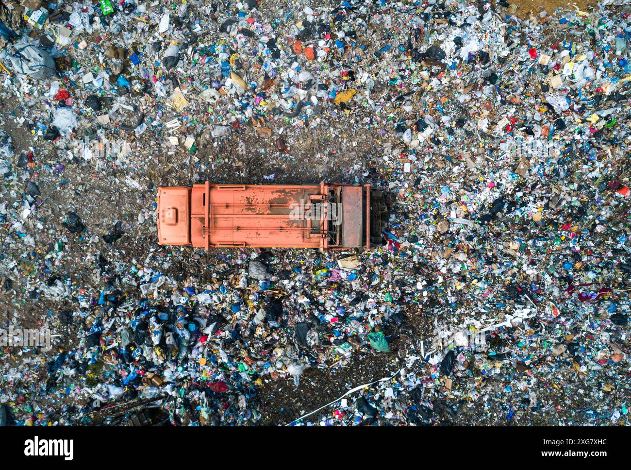 Aerial view of a garbage truck at a landfill during the day Stock Photo ...