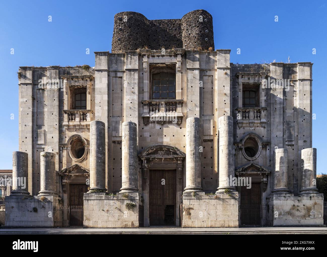 The facade of the church of San Nicolò l'Arena, with its towers and ...