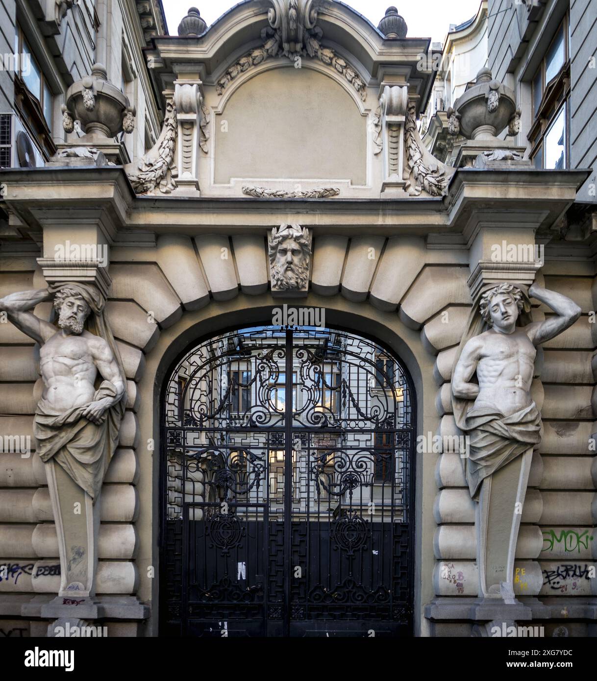 Beautiful, neoclassic entrance in wrought iron, with statues and and ...