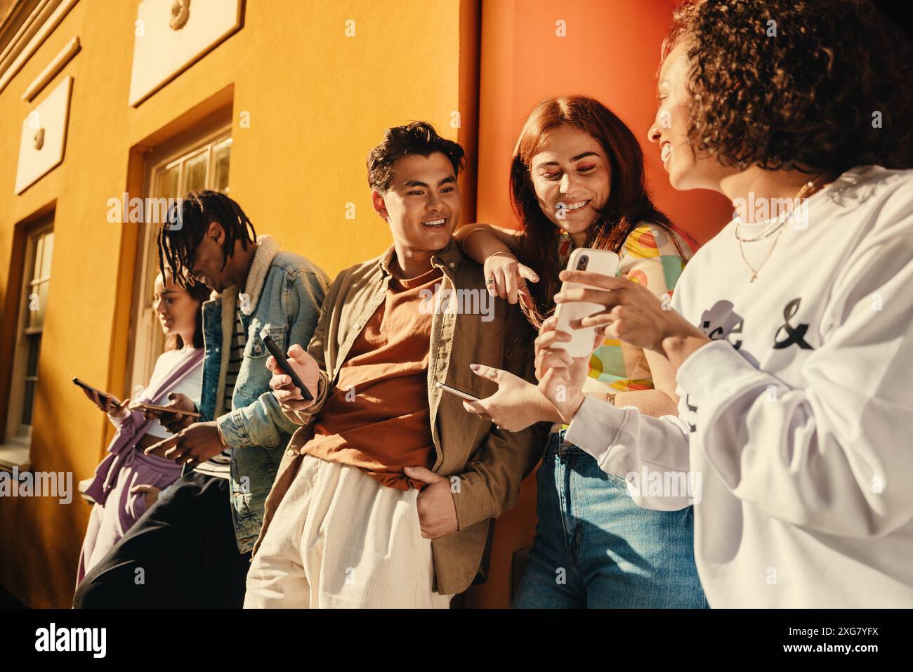 A cheerful group of friends enjoying their time together, sharing ...