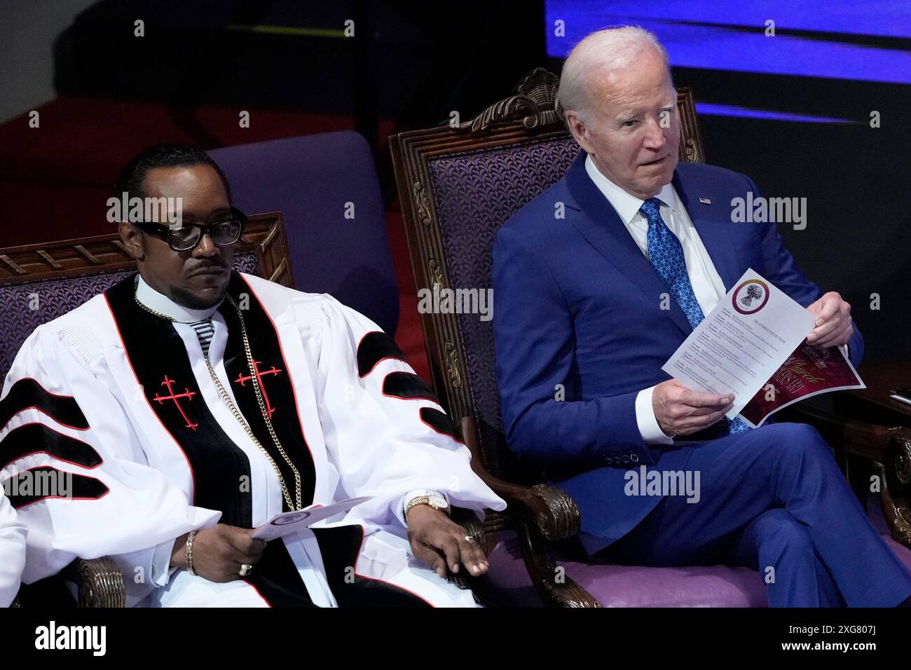 President Joe Biden, right, and pastor Dr. J. Louis Felton sit during a ...