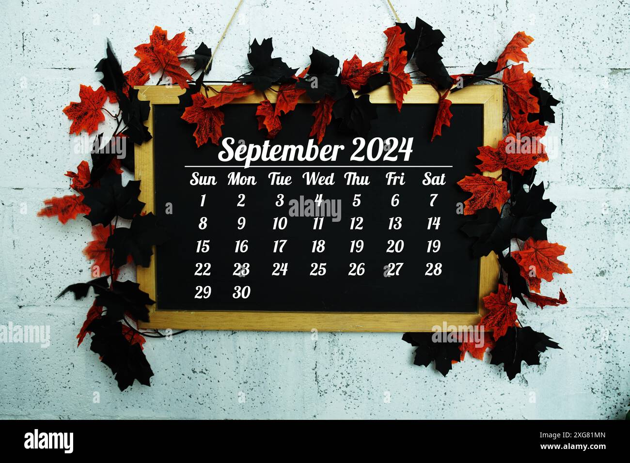 Semptember 2024 monthly calendar with maple leaf decoration Stock Photo ...