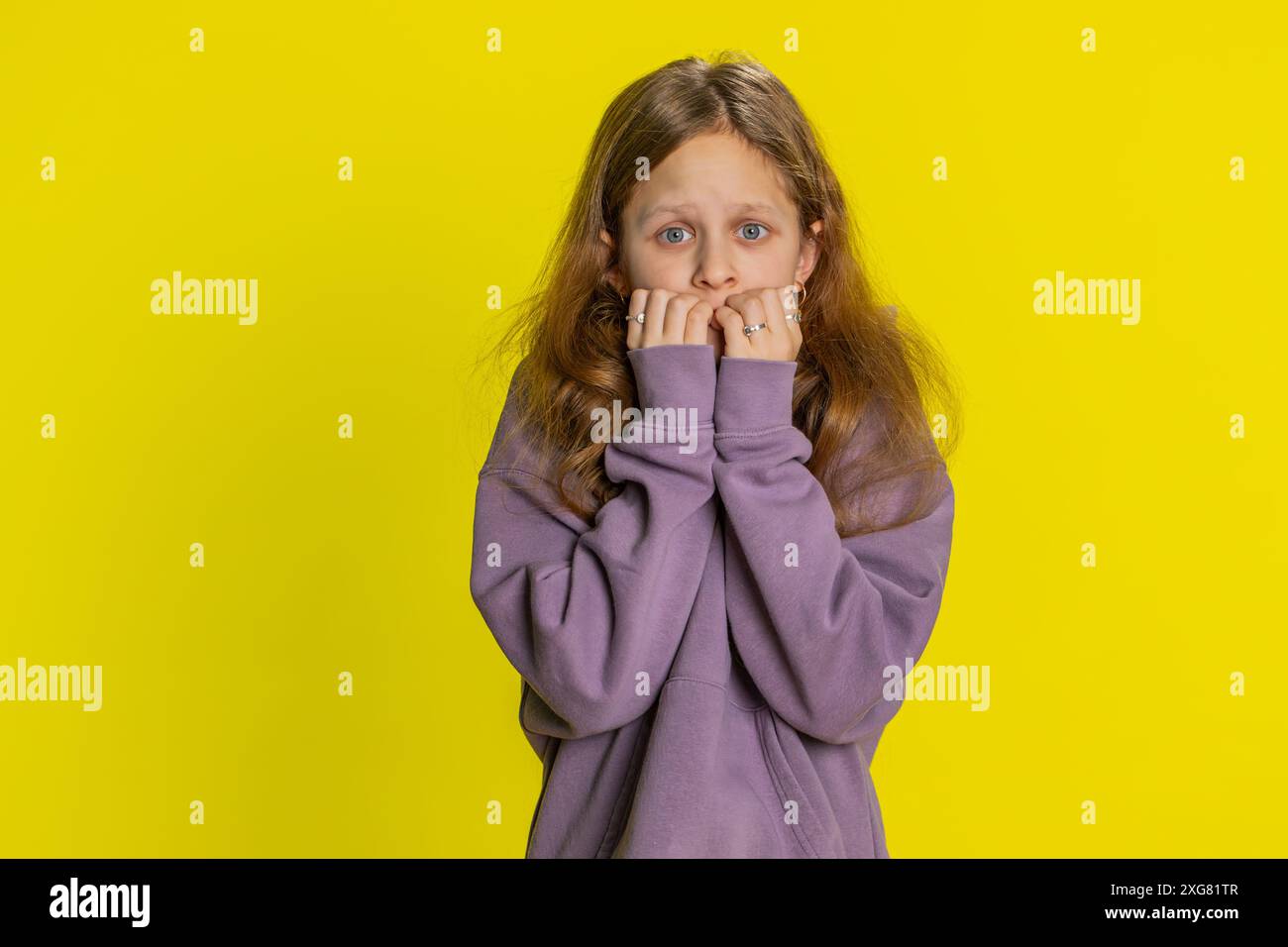 Stressed depressed preteen child girl kid terrified about danger ...
