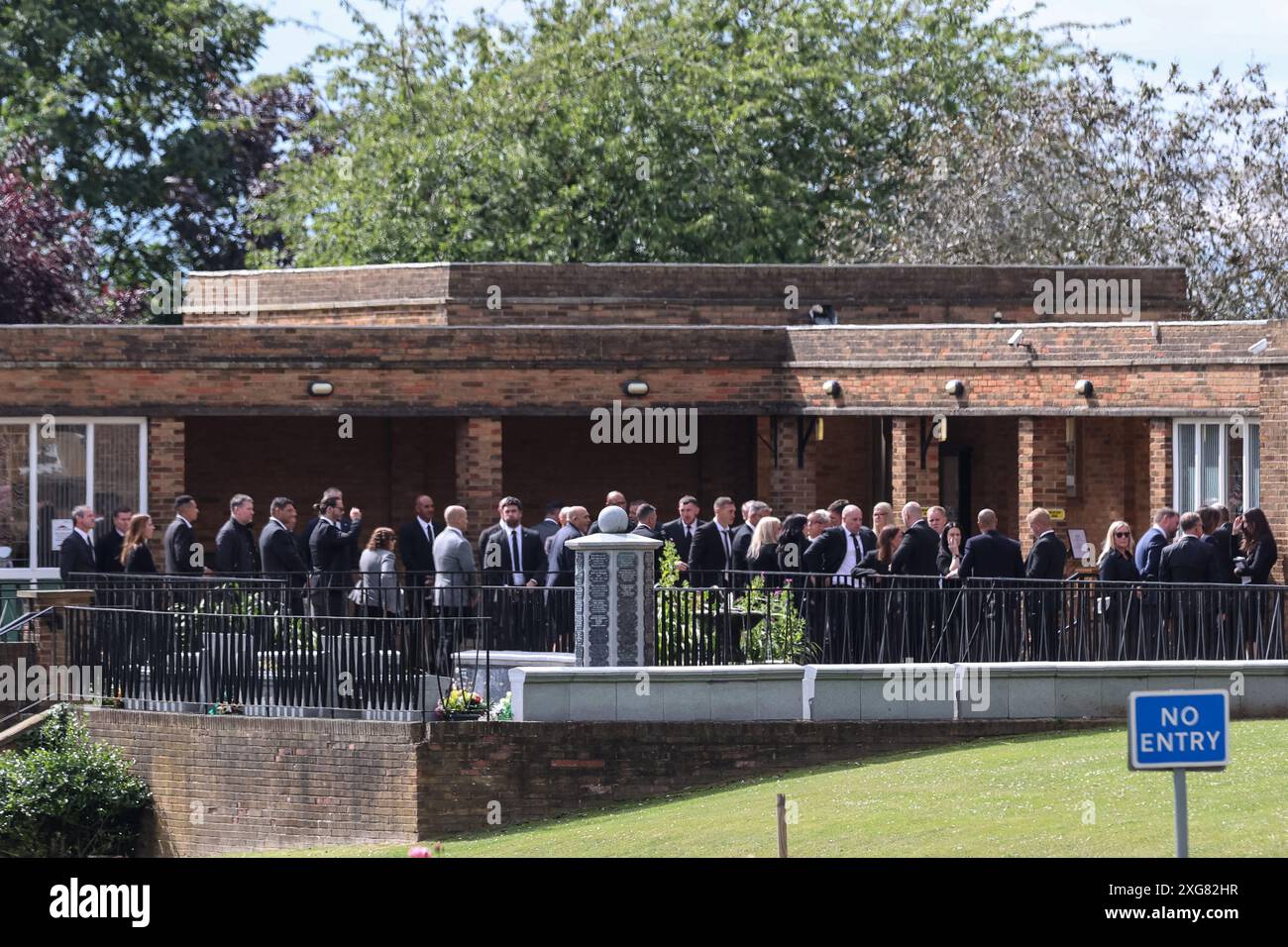 Mourners leave the chapel at Pontefract Crematorium during Rob CBE ...