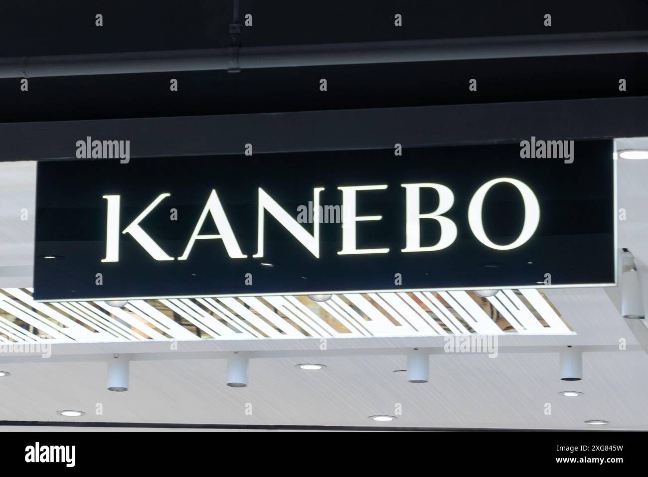 The Kanebo cosmetics store boasts a sophisticated modern setting with ...