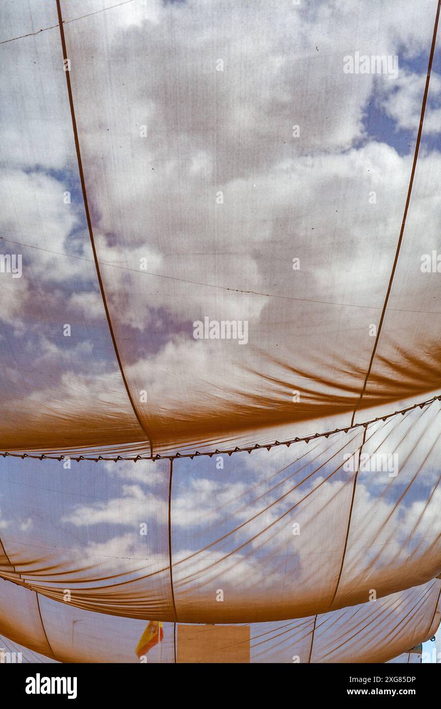 Mesh canopies providing shade over the streets in Seville, Spain ...