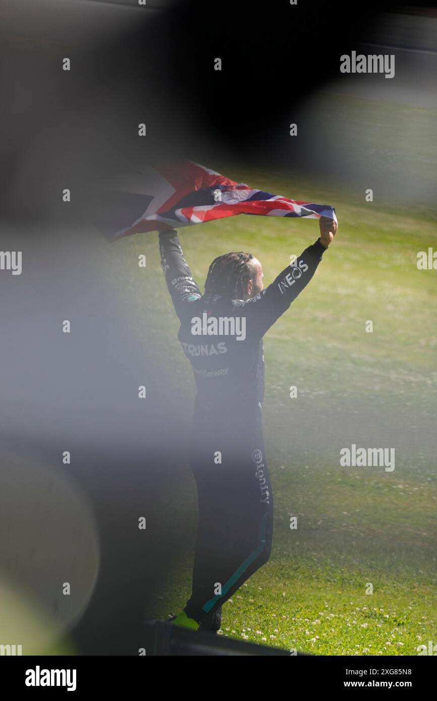 Mercedes driver Lewis Hamilton of Britain celebrates after winning the ...