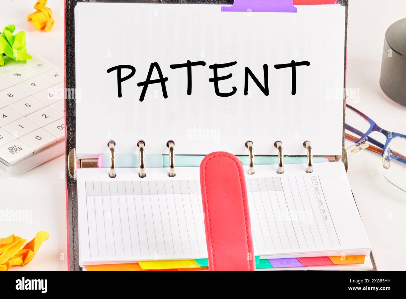 PATENT word written in an open notebook on a white background Stock ...