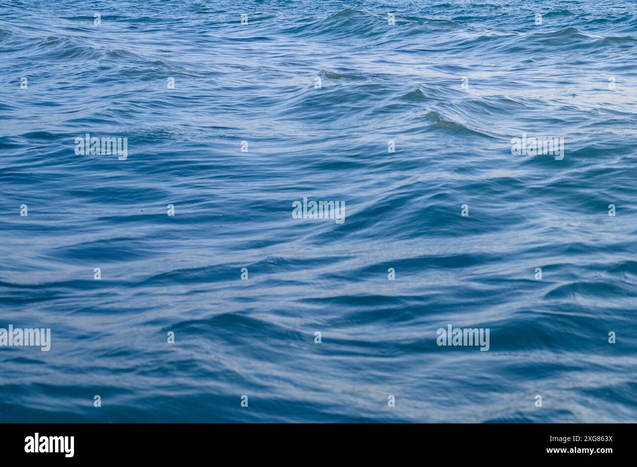 Water surface with light reflections and gentle waves Stock Photo - Alamy