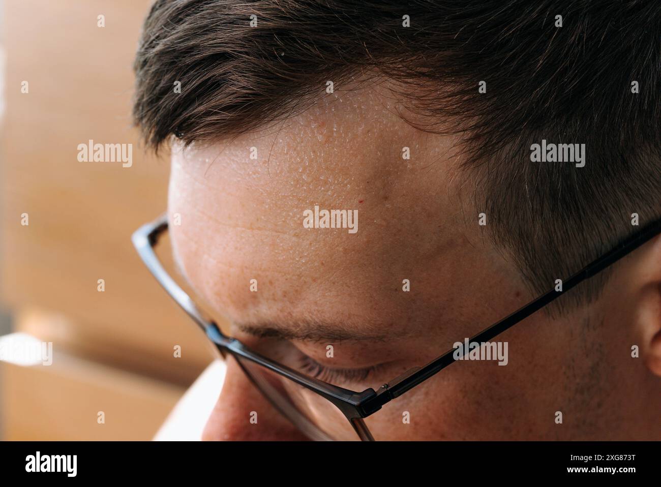 Close-up image of man forehead covered in sweat, showing detail and ...