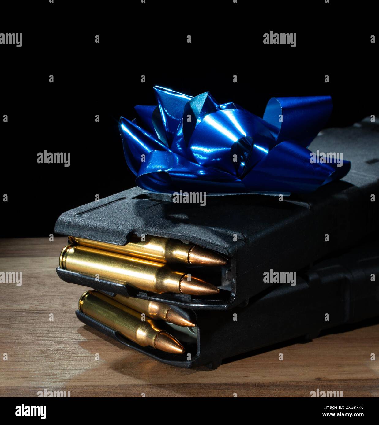 Polymer high capacity AR-15 magazines with a blue bow on top with a ...