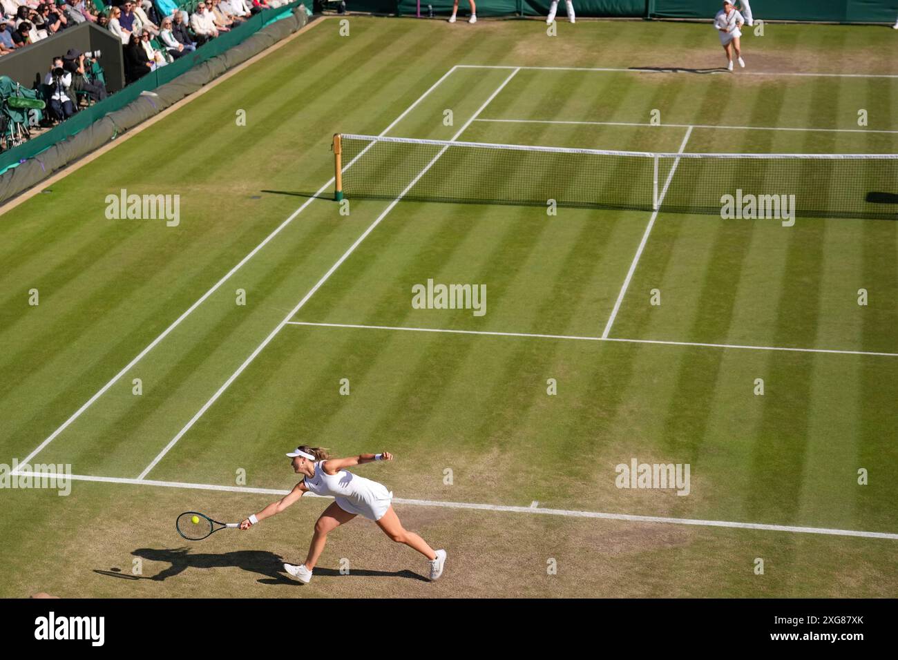 Paula Badosa, left, of Spain plays a backhand return to Donna Vekic of ...