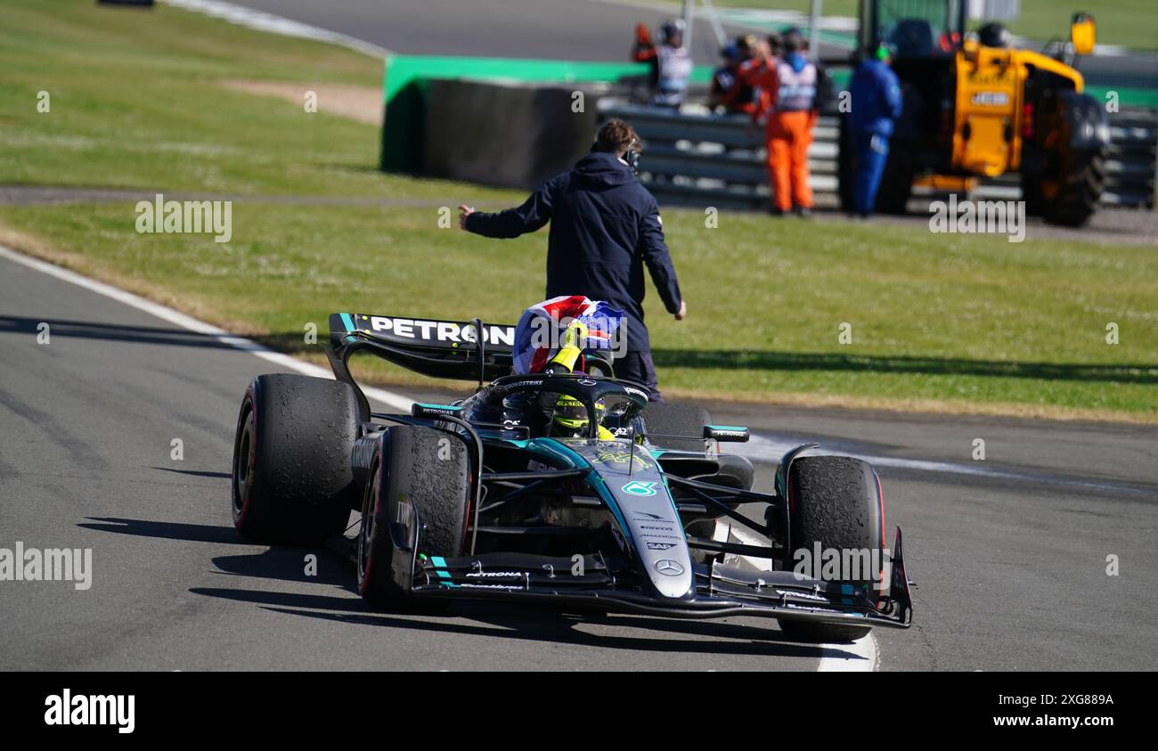 Mercedes' Lewis Hamilton celebrating on his way into the pits at ...