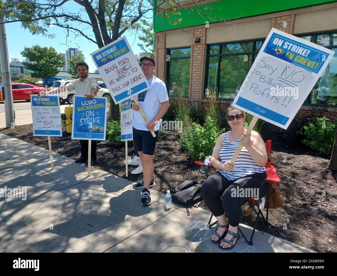 Toronto, ON, Canada - July 7, 2024: LCBO workers in strike with banners ...