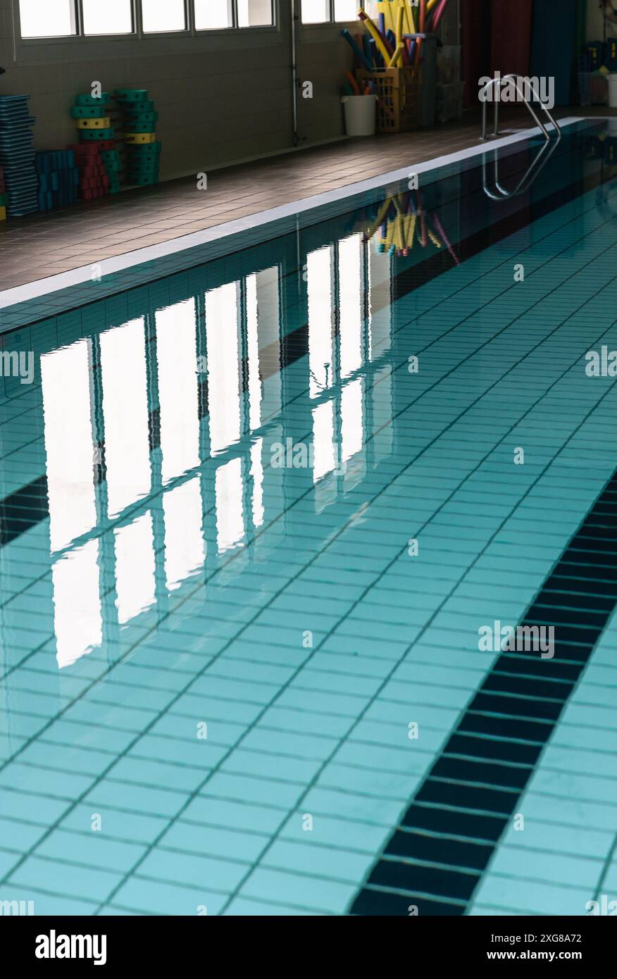 Detailed view of a lane in an indoor swimming pool with clear ...