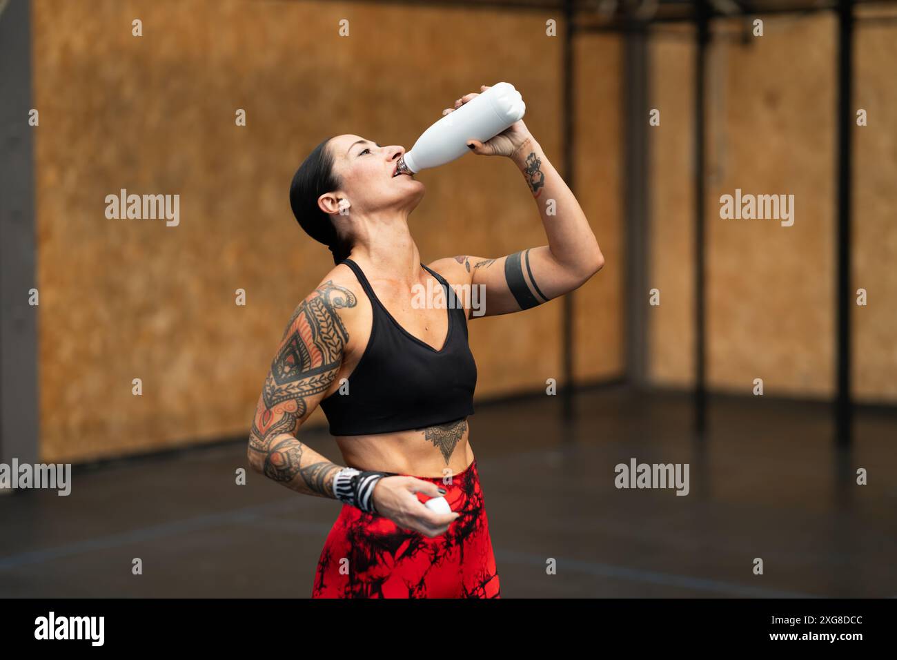 Drinking water after working out hi-res stock photography and images ...