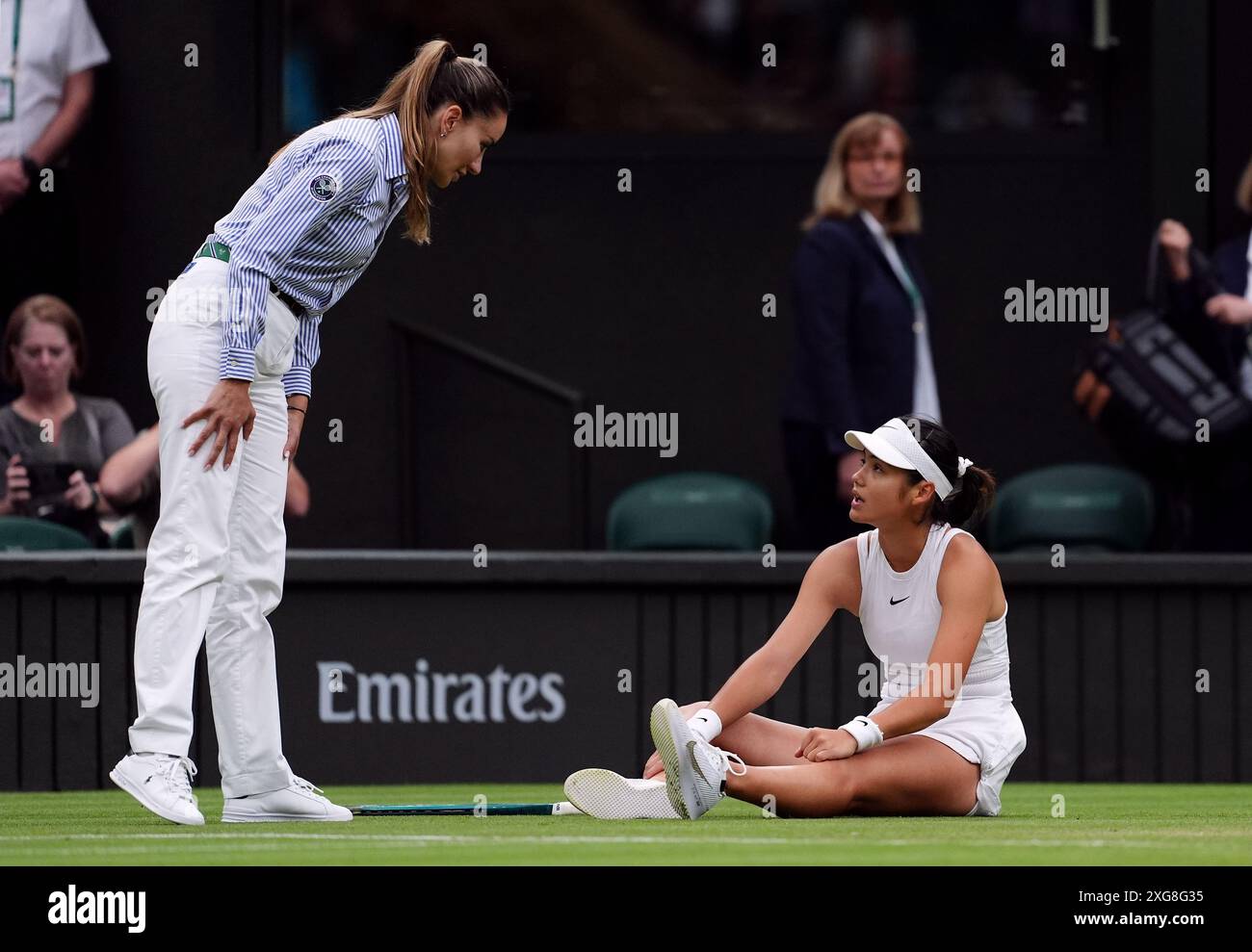 Emma Raducanu slips during her match against Lulu Sun (not pictured) on ...
