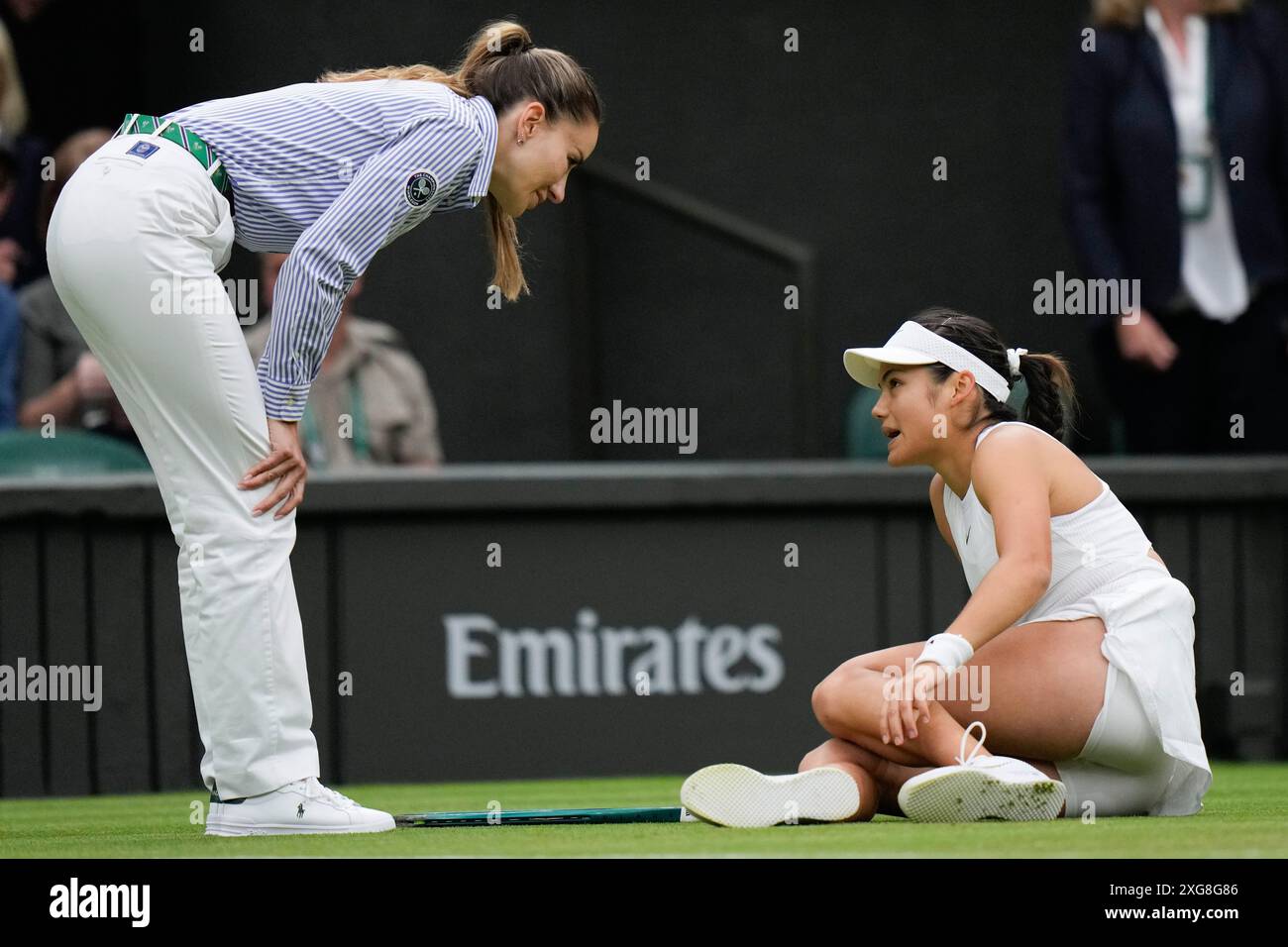 The chair umpire Marijana Veljovic talks to Emma Raducanu of Britain ...