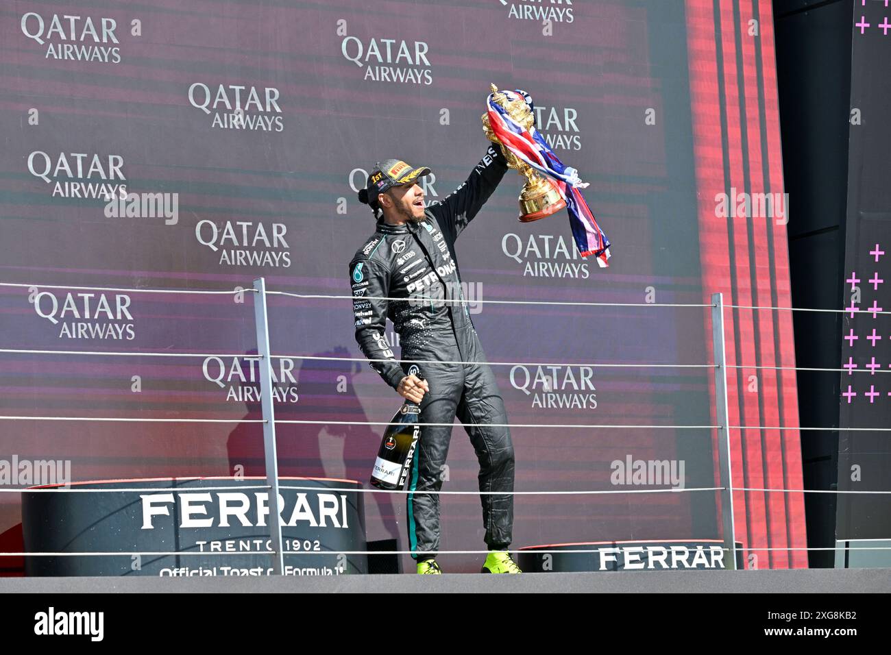 Towcester, UK. 07th July, 2024. Lewis Hamilton celebrates as he wins ...