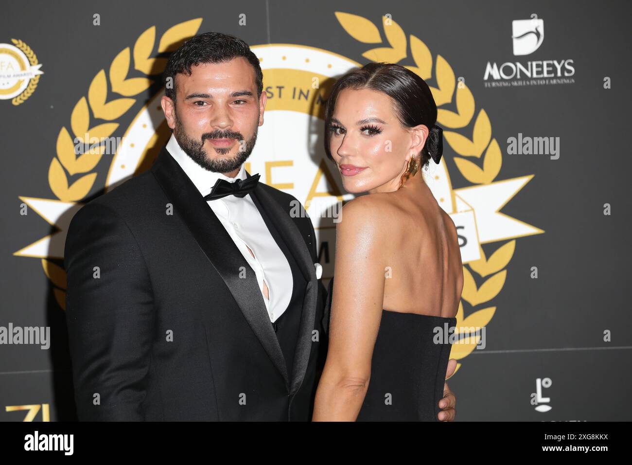 Steven Blades and Natalie Dunn attend National Film Awards in London ...