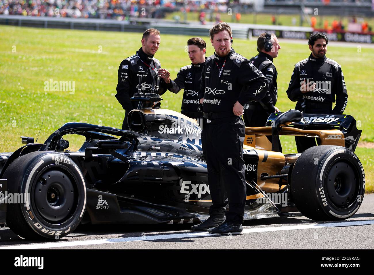 APX GP Team crew filming in the paddock for the Apex F1 movie by Apple ...