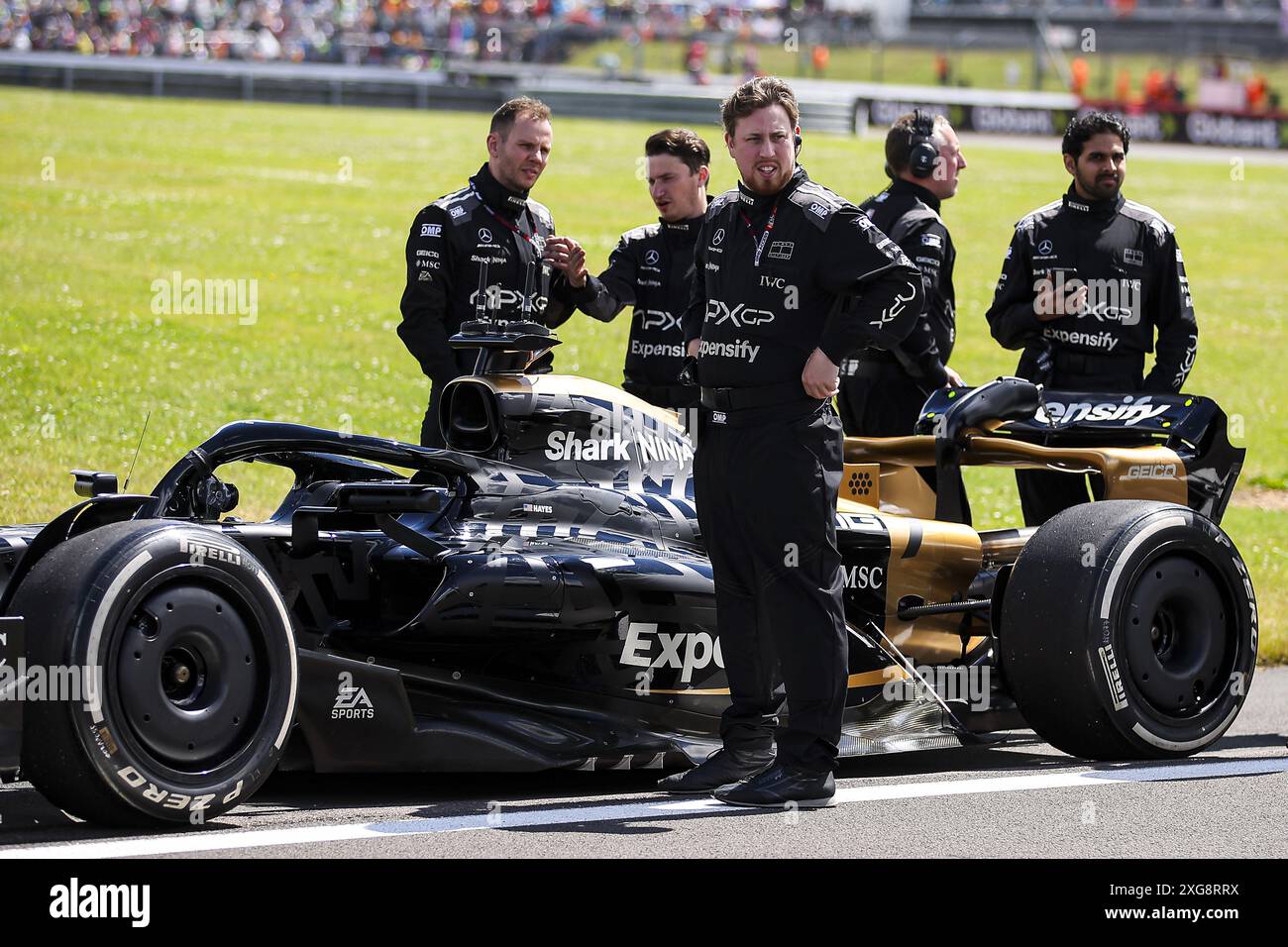 APX GP Team crew filming in the paddock for the Apex F1 movie by Apple ...