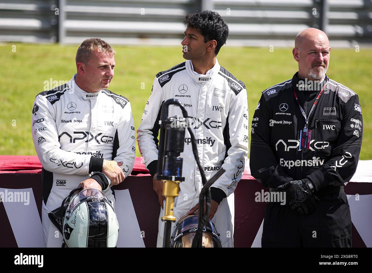 APX GP Team crew filming in the paddock for the Apex F1 movie by Apple ...